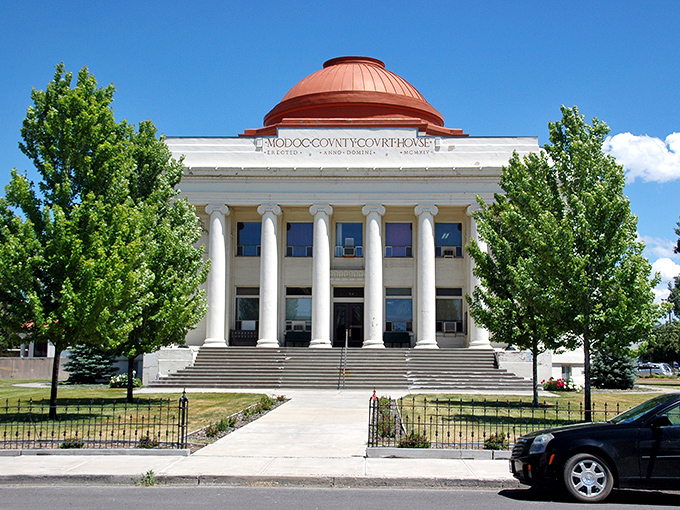 The Modoc County Courthouse looks like it was plucked from a state capital – those columns aren't compensating, they're commemorating.
