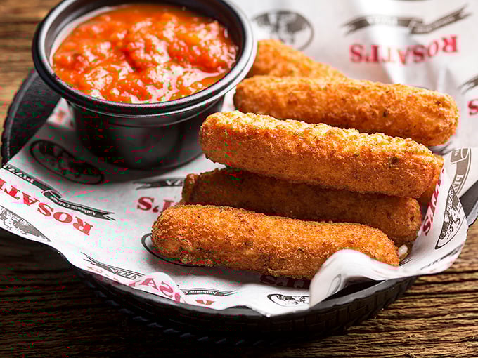 Mozzarella sticks with that perfect pull – the cheese stretches like a Sunday afternoon. Marinara sauce stands by, ready for its supporting role.