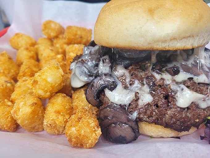 A mushroom Swiss burger where fungi and dairy unite in a harmony so perfect, it could headline at Carnegie Hall.