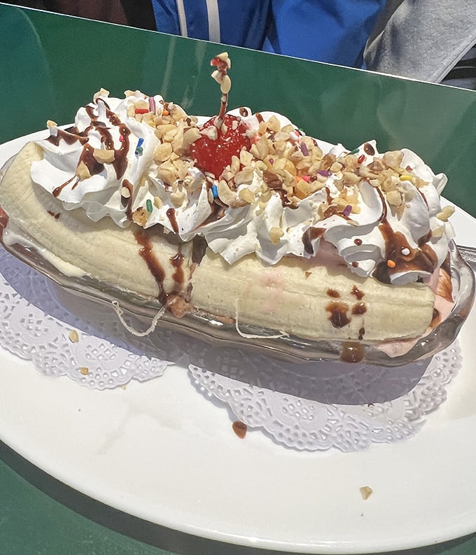 This banana split isn't just dessert—it's architecture. The whipped cream skyscrapers and cherry on top make it the Manhattan of sweet treats.