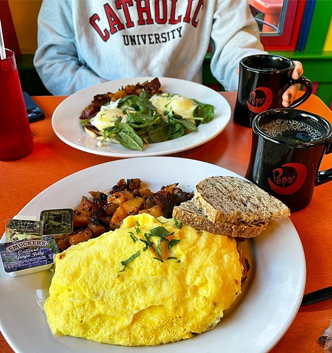 Breakfast perfection doesn't exi— Oh wait, it does. Golden omelets and crispy potatoes that make waking up worth the trouble.