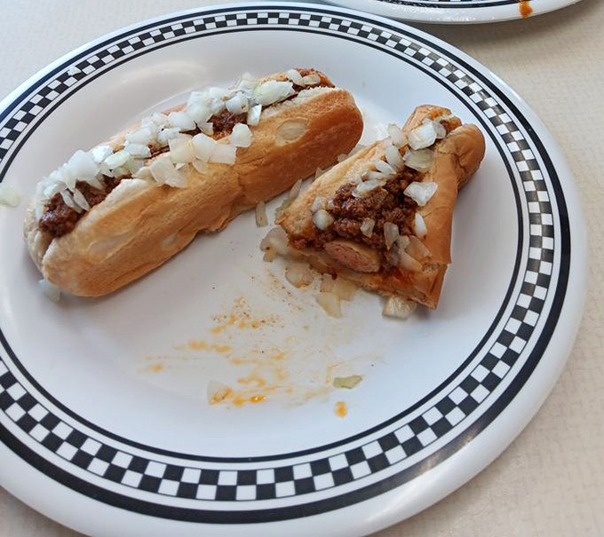 The original coney in its natural habitat—simple, unadorned perfection with just the right ratio of chili, onions, and hot dog.
