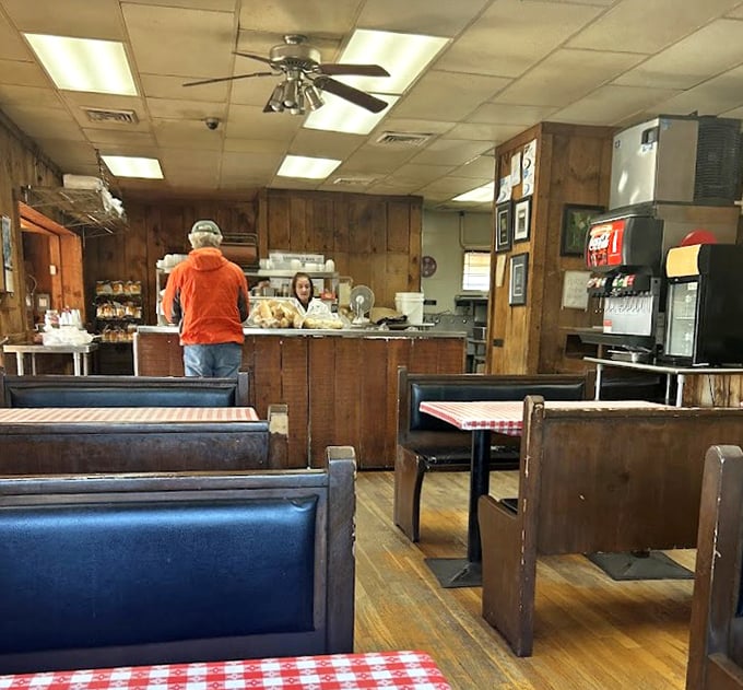 The dining room feels like stepping into 1975, when conversations happened face-to-face and nobody was trying to create content while eating.