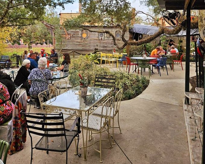 Al fresco dining beside the "Boat in the Moat" offers a perfect spot to digest both lunch and the delightful oddity of it all.