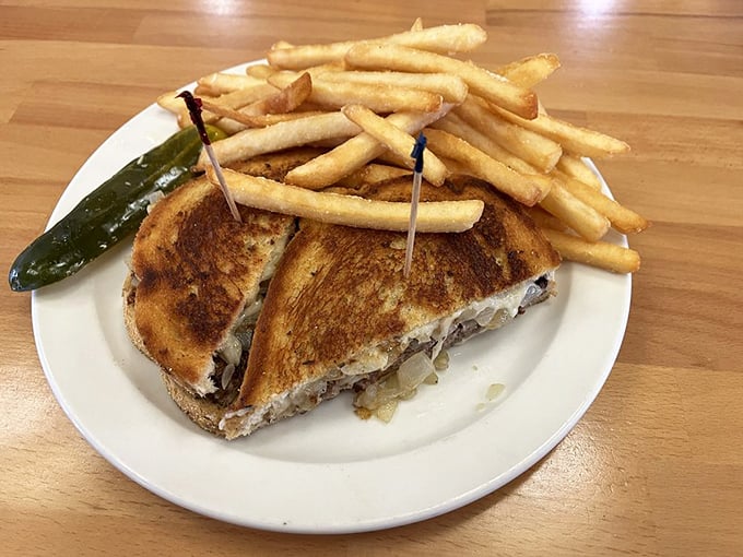The humble patty melt – proof that sometimes the best things in life come between two slices of perfectly grilled bread.