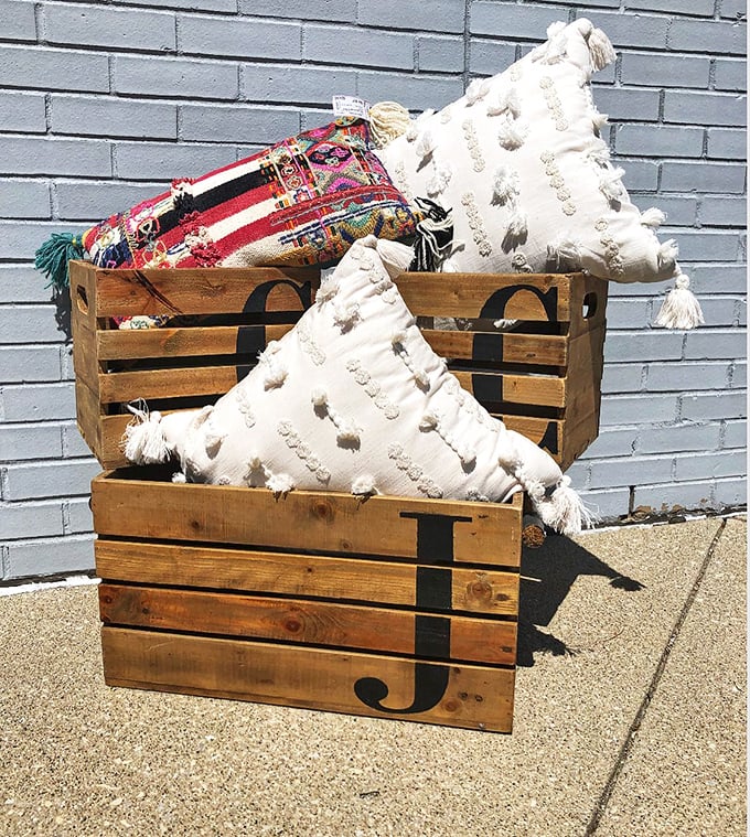 These textured pillows in wooden crates aren't just home décor—they're the finishing touches your couch has been dreaming about.