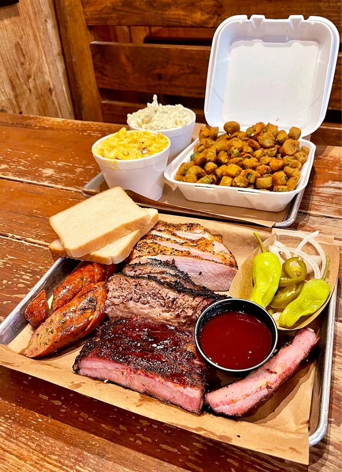 A barbecue platter that requires both hands and a strategic eating plan. This isn't a meal—it's an expedition.