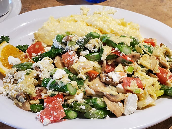 This isn't just an omelet—it's an edible art piece where every colorful ingredient plays its part in the flavor symphony.