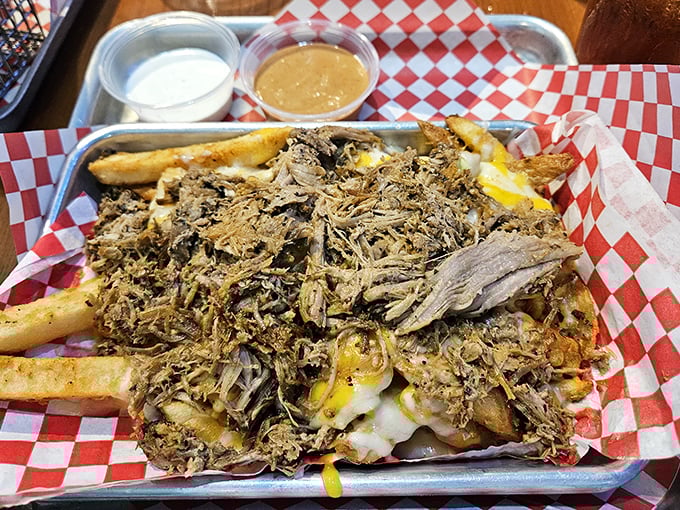 Pulled pork piled high atop cheese fries—a creation that makes you wonder if the chef somehow read your most indulgent food diary entries.