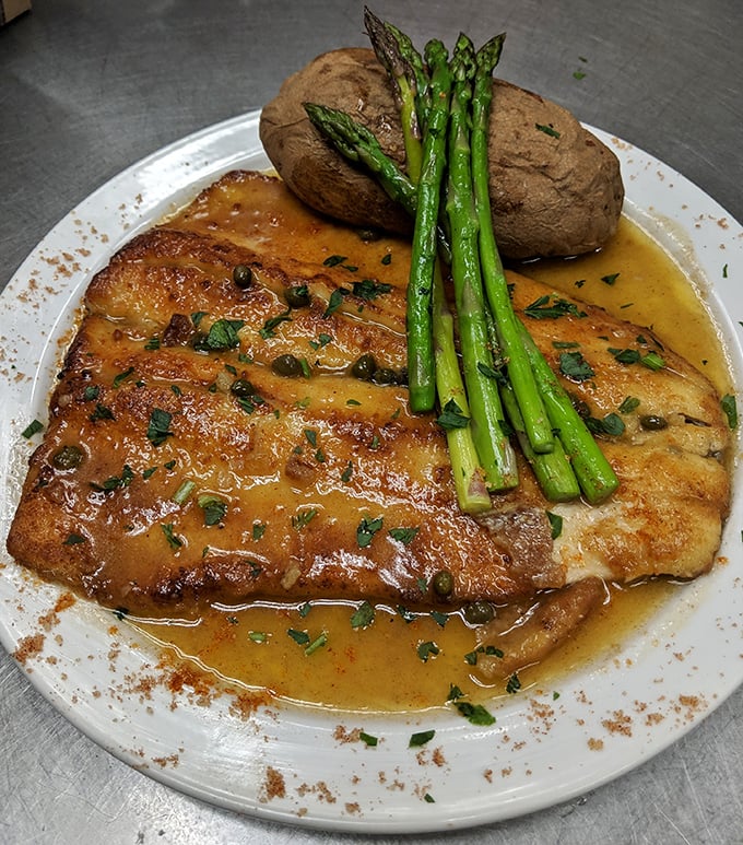 This rainbow trout with asparagus shows Westside isn't just about breakfast—their dinner game deserves its own standing ovation.
