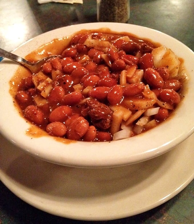 The famous chili bean soup—a hearty bowl of comfort where beans and onions swim happily in a rich, spiced broth that warms from the inside out.