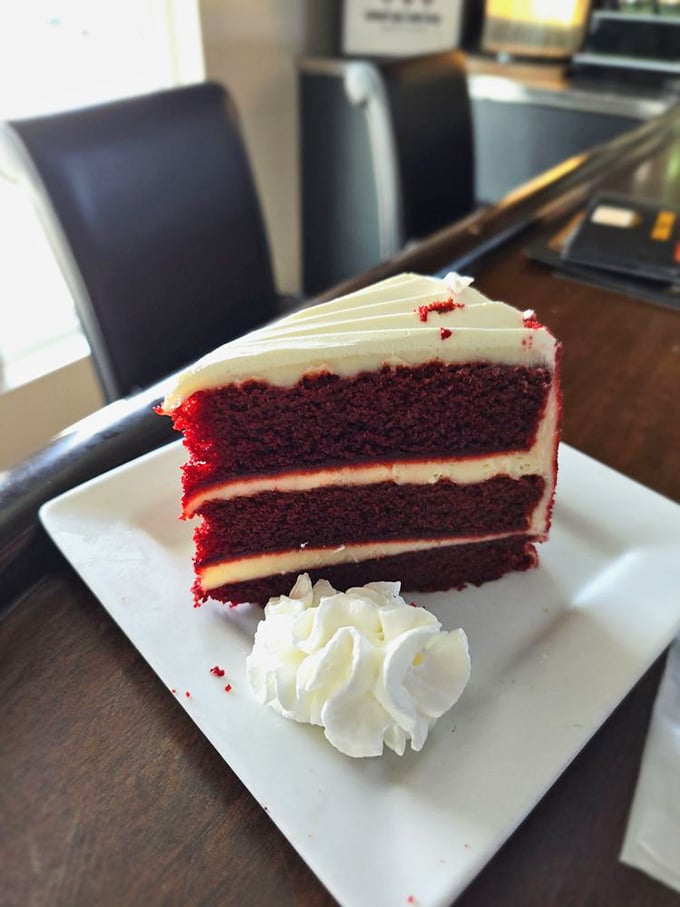 Red velvet cake that doesn't whisper "indulgence"—it belts it out like a Broadway finale, with cream cheese frosting taking a well-deserved bow.