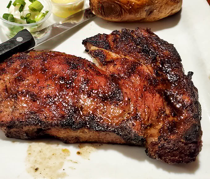 This rib-eye has the kind of char that makes you want to write poetry. The mashed potatoes aren't just a side—they're a pillow for flavor.