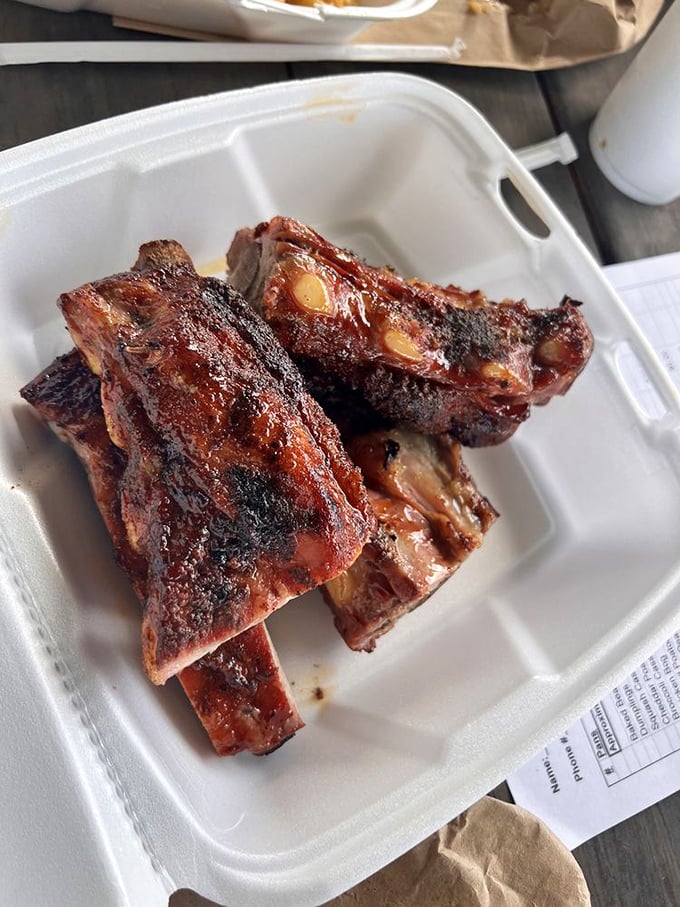 These ribs don't just fall off the bone—they practically jump onto your fork, eager to introduce themselves to your taste buds.