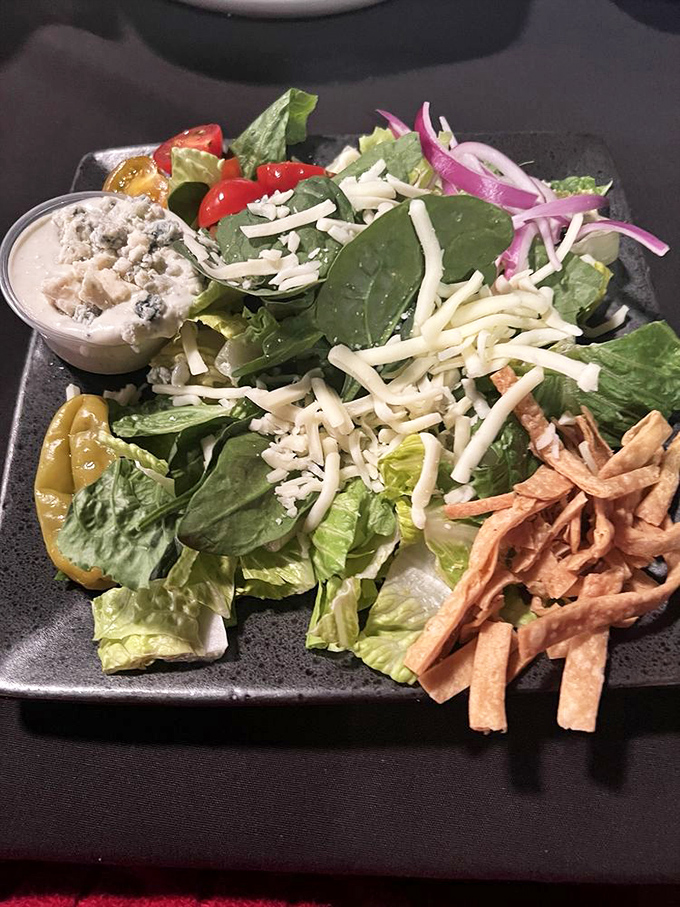Even the house salad gets the star treatment here—fresh greens, vibrant veggies, and those crispy tortilla strips adding the perfect crunch factor.