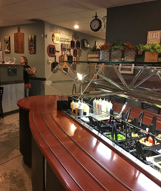 The condiment station—where pizza customization dreams come true. A splash of this, a dollop of that, and your slice is transformed.