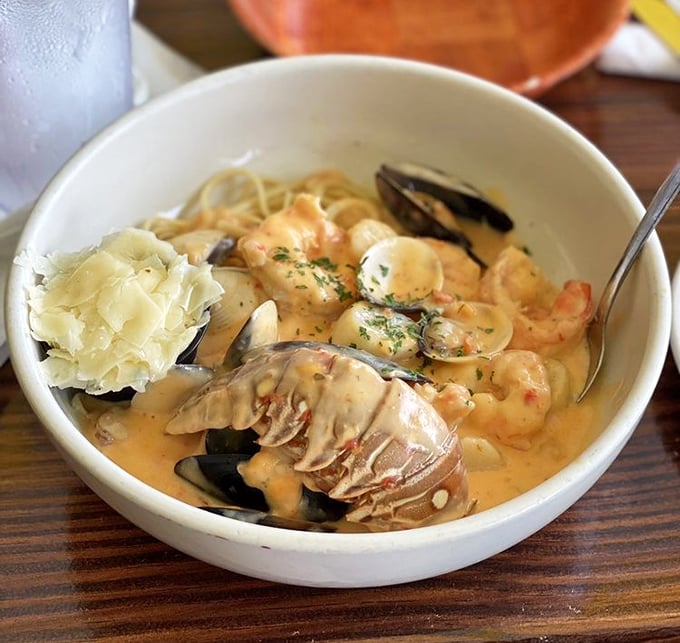 A seafood medley swimming in creamy broth. This isn't just soup—it's a maritime celebration in a bowl. 