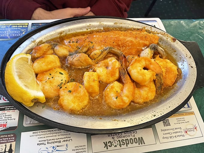 Seafood swimming in buttery goodness—these shrimp look like they've found their happy place, and soon that place will be your stomach.