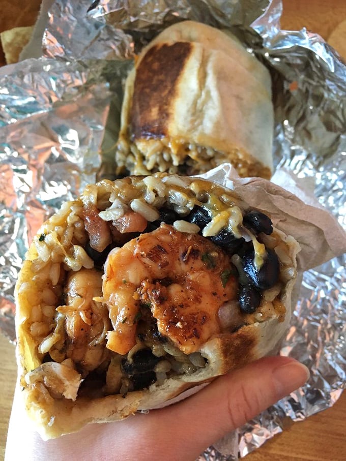 Not just a burrito – a portable feast featuring plump shrimp, rice, and beans that puts sad desk lunches everywhere to shame.