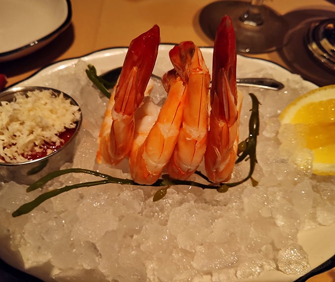 Shrimp cocktail that stands at attention, nestled on ice like jewels—the appetizer equivalent of dressing for the occasion.