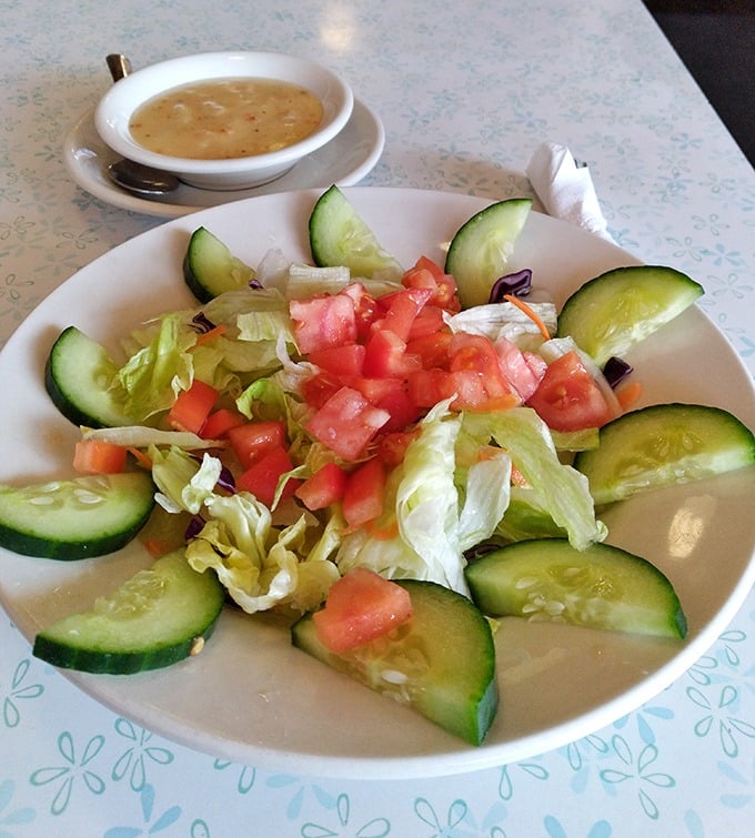 A garden-fresh side salad provides the perfect counterpoint to Cincinnati's heartier offerings – even vegetables look happier at Blue Jay.