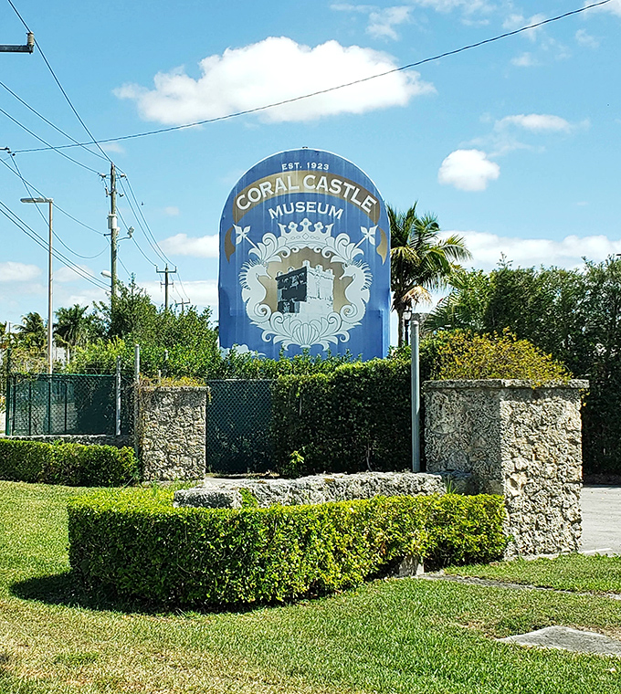 The blue Coral Castle Museum sign announces your arrival at Florida's most perplexing roadside attraction since the Mystery Spot.