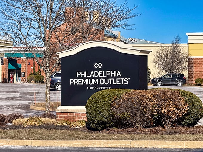 The sign says it all—premium shopping without the premium prices. Like finding a Michelin-starred meal at diner prices.