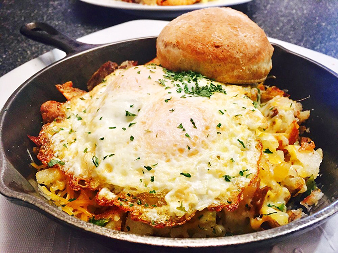 The skillet heap – where potatoes, eggs, and cheese unite in a cast-iron masterpiece that's worth every calorie and the extra napkins.