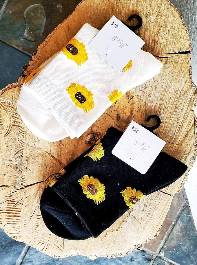 Sunflower socks that bring unexpected joy—because even in Florida, sometimes your ankles deserve their own little gardens.