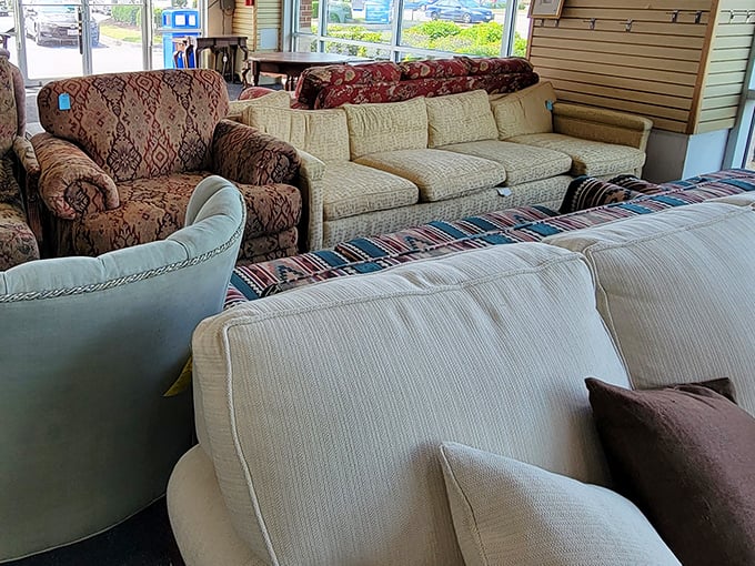 The sofa section offers a time-travel tour through America's living room history—from grandma's floral patterns to minimalist modern designs.