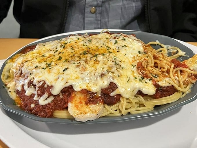 Spaghetti topped with shrimp and melted cheese—it's what would happen if Italy and New Orleans had a delicious culinary love child.