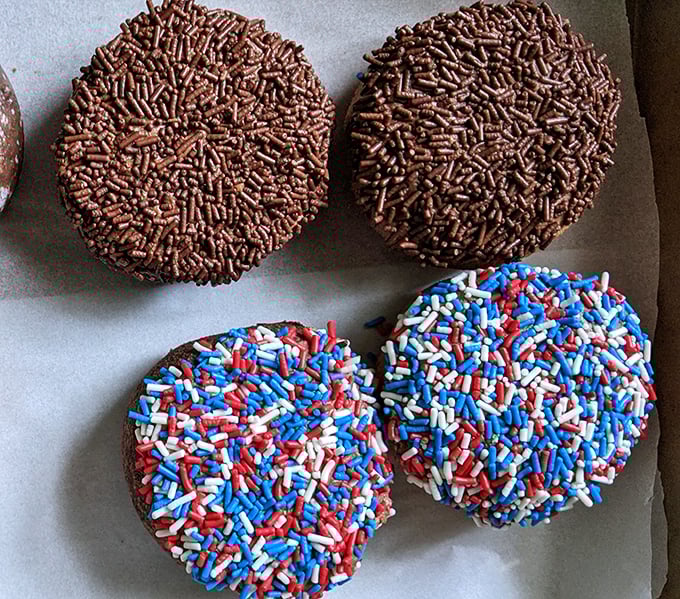 Patriotic sprinkles on chocolate frosting – because nothing says America quite like excessive sugar decoration.