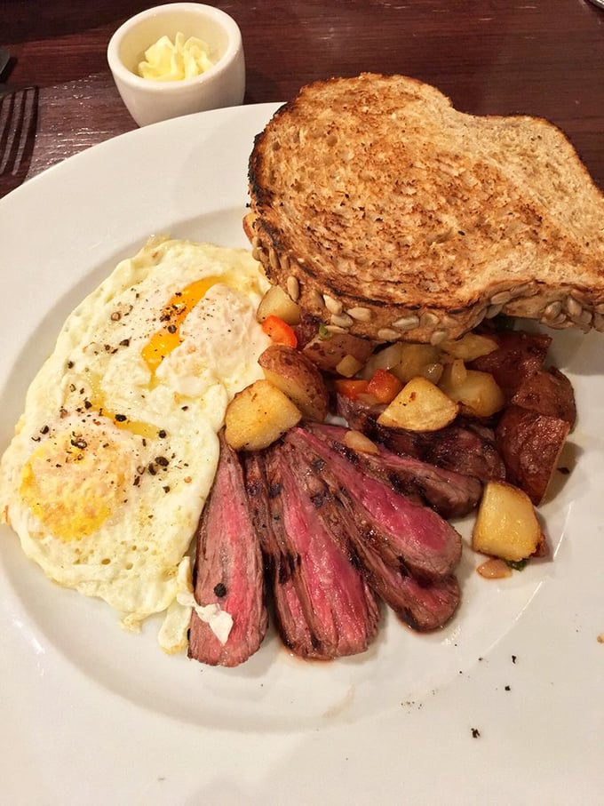 Brunch doesn't get more beautiful than this—pink-centered steak, sunny eggs, and golden potatoes that make morning meetings completely optional.