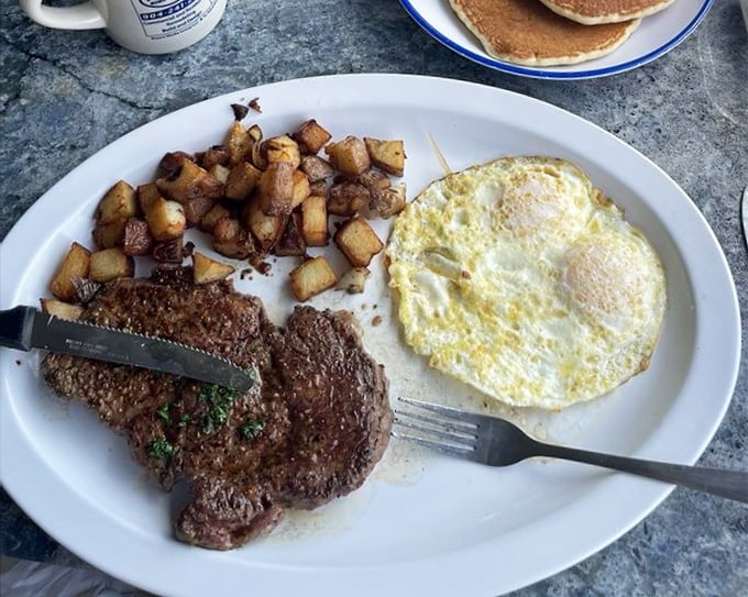 Steak and eggs: the breakfast of champions, vacation splurgers, and anyone who believes mornings deserve respect. Those home fries are crispy little miracles.