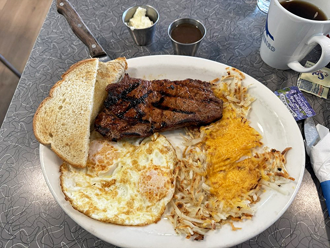 When steak and eggs share a plate, it's not just breakfast—it's a power move. Those hash browns are the unsung heroes.