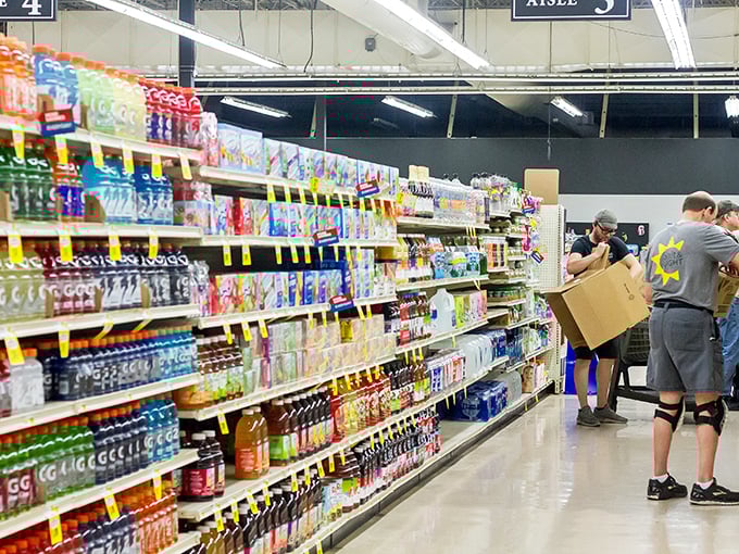 Shoppers navigate aisles of beverages and snacks, proving Salt & Light isn't just about secondhand treasures—it's a one-stop community resource.