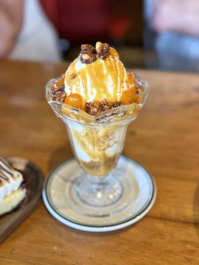 Even dessert keeps the New England theme—this sundae with its caramel drizzle and crunchy topping offers the perfect sweet finale to a seafood feast.