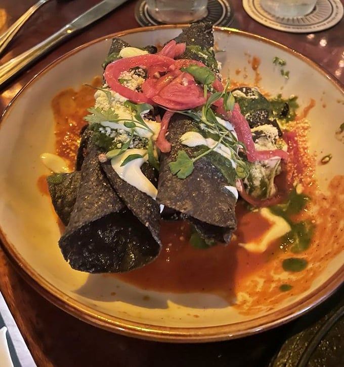 These aren't your corner taco shop offerings—dark, handmade tortillas cradling thoughtfully composed fillings that redefine taco expectations.