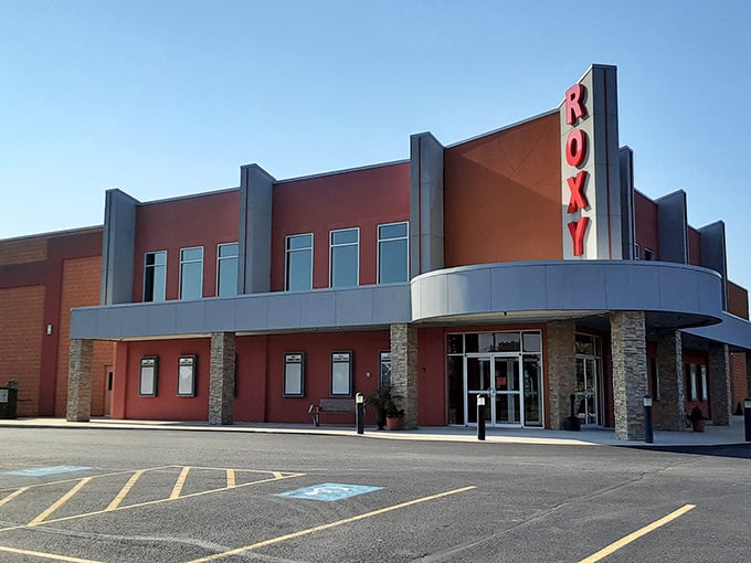 The Roxy Theater's Art Deco facade promises small-town movie magic – where popcorn still costs less than your mortgage and ushers remember your name.