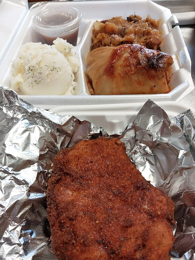 The Polish trifecta: stuffed cabbage, mashed potatoes, and what appears to be a perfectly breaded cutlet. This is how you experience Poland without a passport.