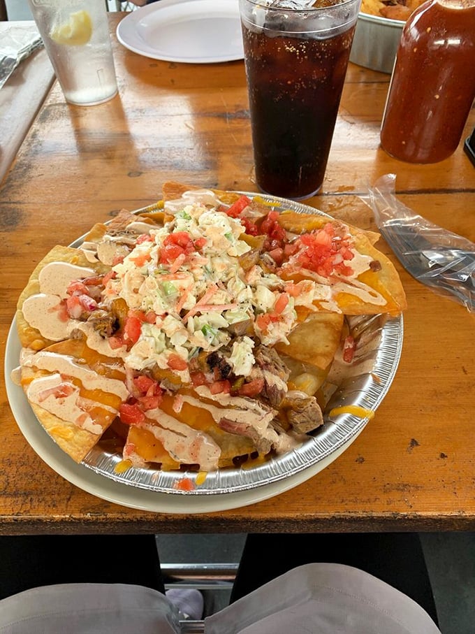 BBQ nachos that laugh at conventional boundaries. When pulled pork meets tortilla chips, it's not fusion—it's just good sense.