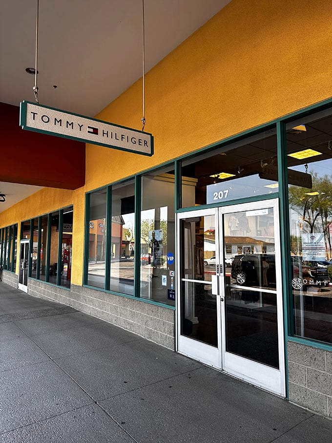 Tommy Hilfiger's classic Americana awaits behind those gleaming doors, where red, white, and blue never goes out of style.