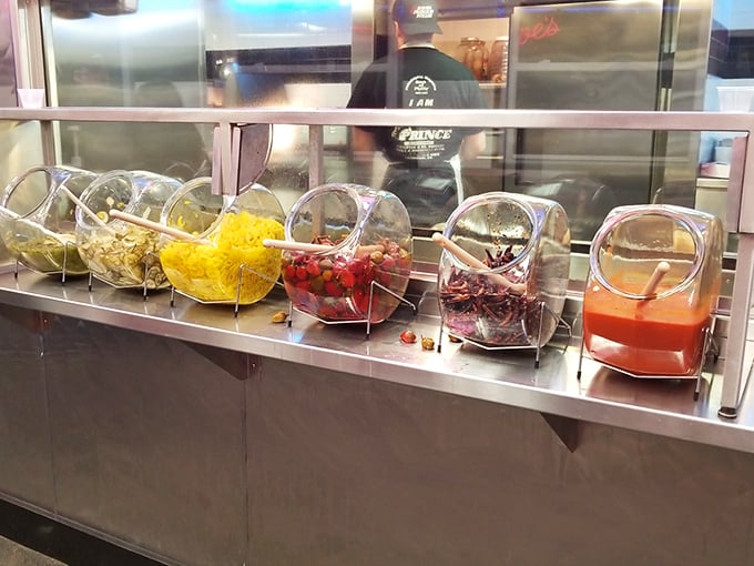 The topping station—where personalization happens. Like choosing accessories for the perfect outfit, but deliciously edible.