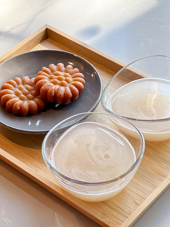Delicate honey cookies paired with traditional rice punch – like dessert diplomacy bringing sweet harmony to the end of your meal.