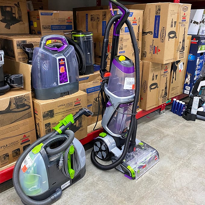 Vacuum cleaners standing like soldiers ready for dust battle—name brands at prices that don't suck the life from your wallet.