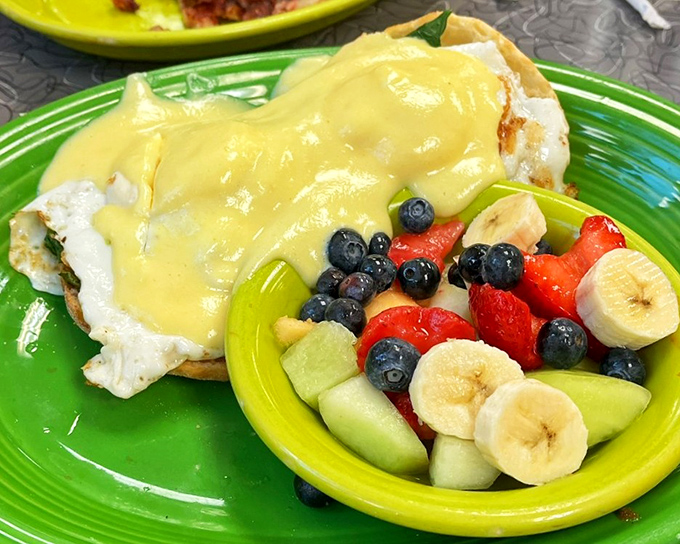A Benedict that proves vegetables deserve the royal treatment too. That fresh fruit side dish is nature's candy after a savory main course.