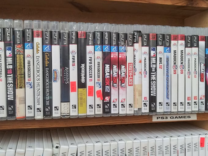 Gaming nostalgia fills these shelves where PlayStation classics meet modern entertainment at unbeatable prices.