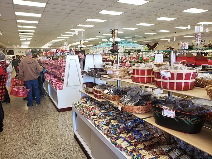 Customers navigate the sweet labyrinth with the focused determination of chocolate archaeologists on an important dig.