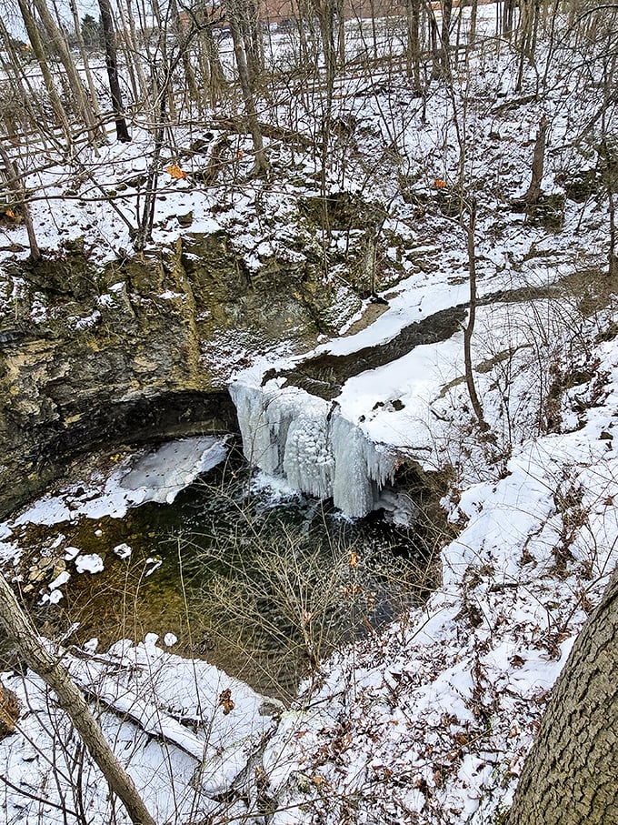Winter's frozen sculpture garden. The falls take a pause, suspended in crystalline stillness – nature's version of pressing the magnificent pause button.
