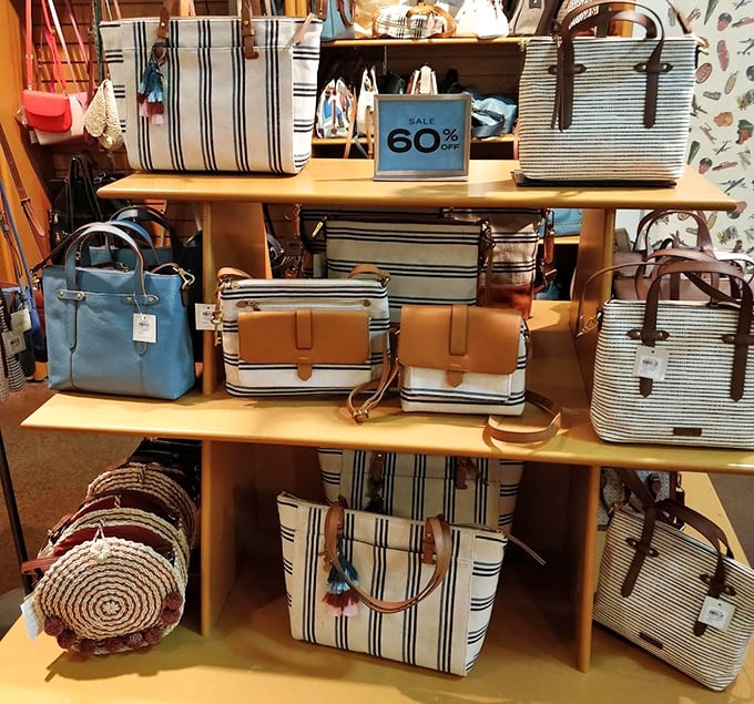Handbag heaven with stripes that mean business. At 60% off, these aren't just purses – they're investment pieces with immediate returns.
